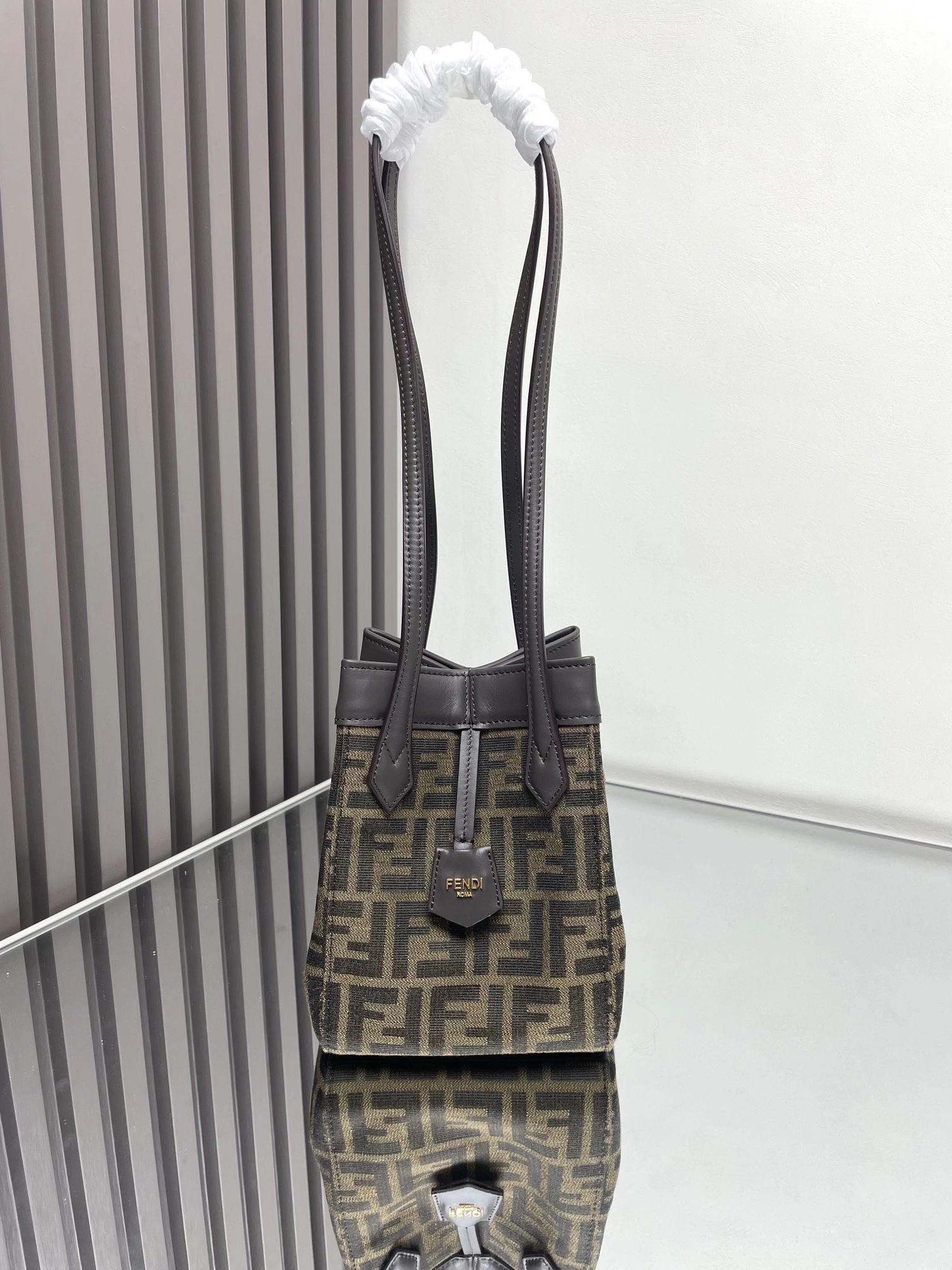 Indistinguishable Fendi Bucket Bags