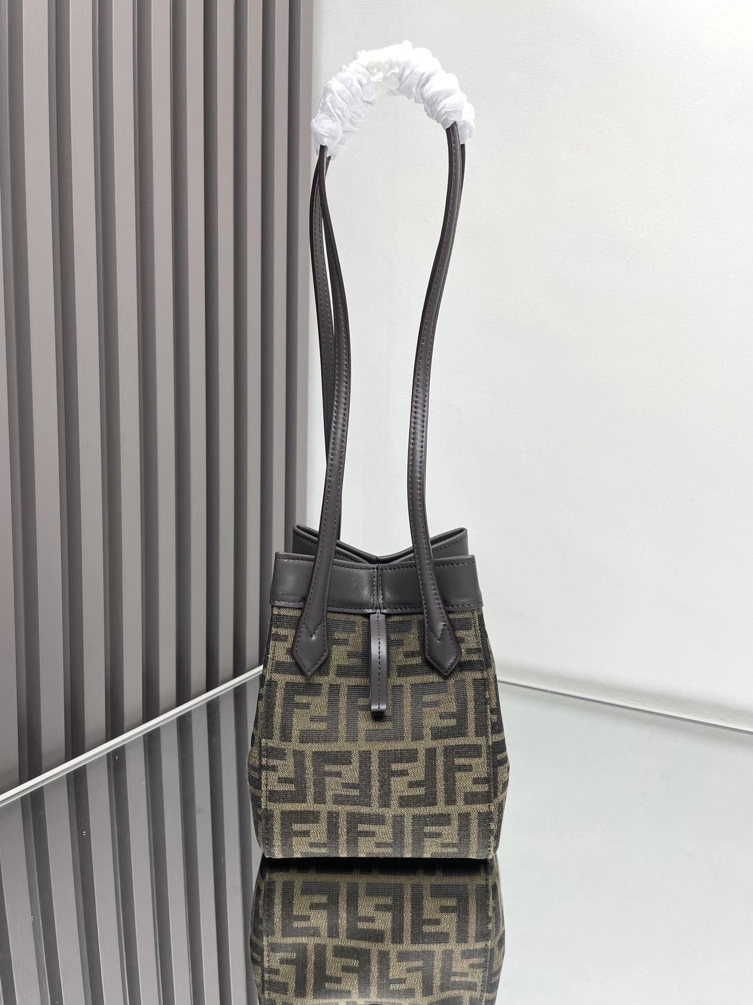 Indistinguishable Fendi Bucket Bags