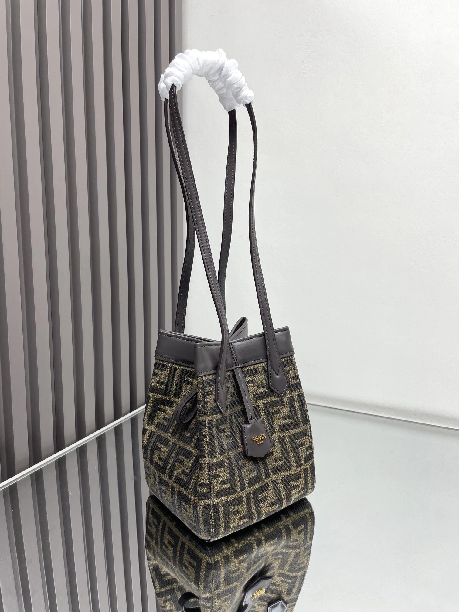 Indistinguishable Fendi Bucket Bags