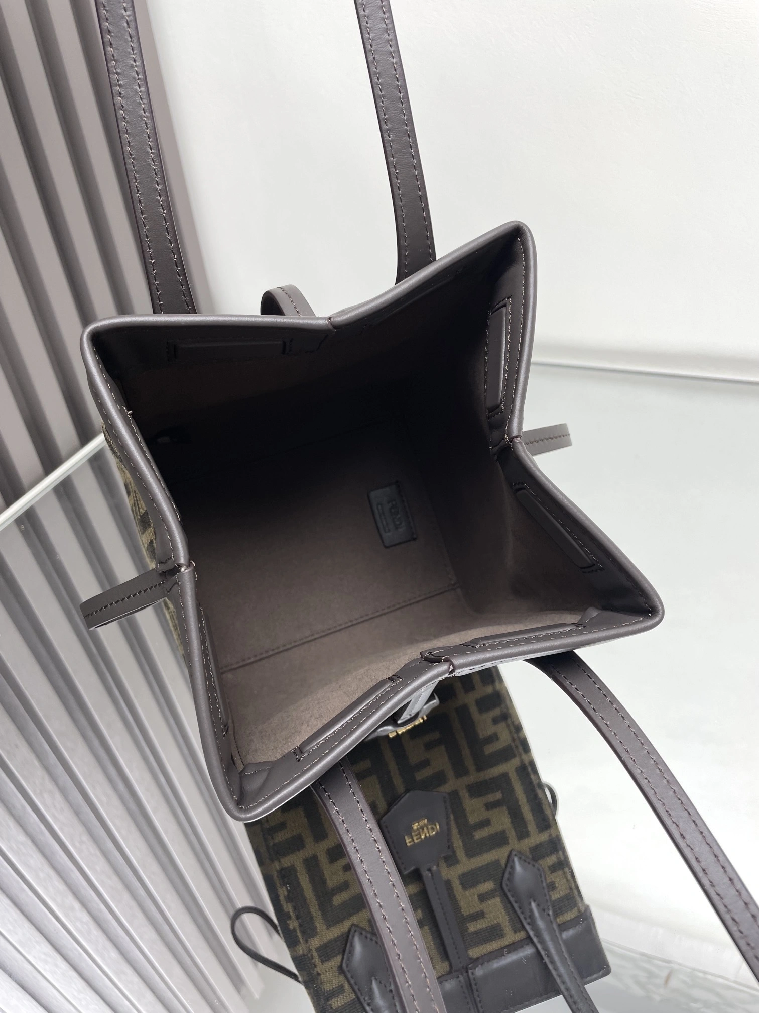 Indistinguishable Fendi Bucket Bags