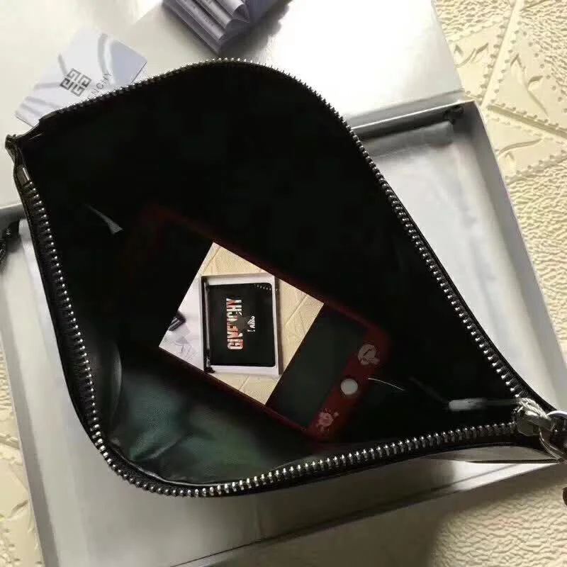 Indistinguishable Givenchy Clutch Bags