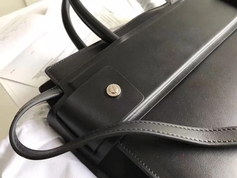 Value-priced Givenchy Top Handle Bags