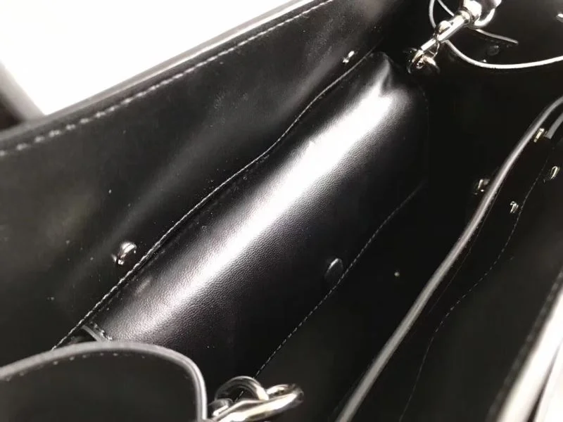 Value-priced Givenchy Top Handle Bags