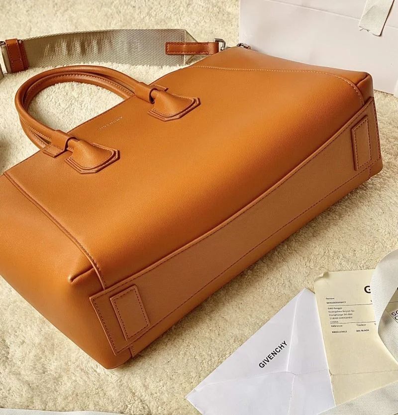 Value-priced Givenchy Top Handle Bags