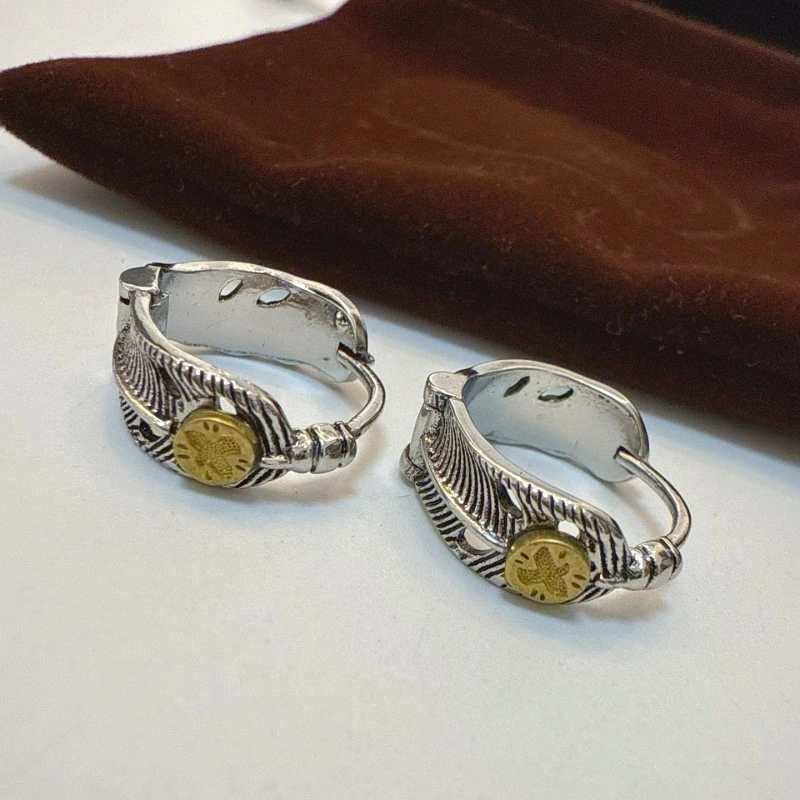 Goros Earrings