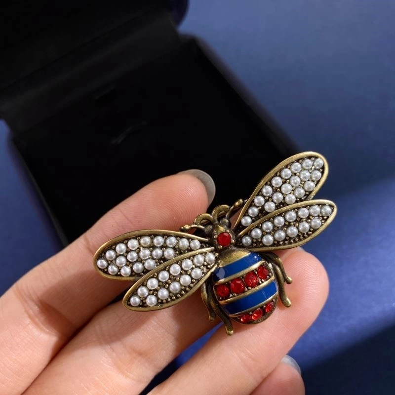 Value-priced Gucci Brooches