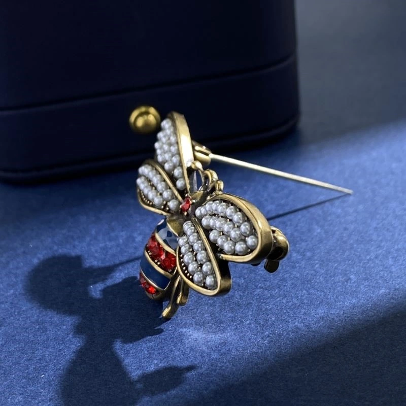 Value-priced Gucci Brooches