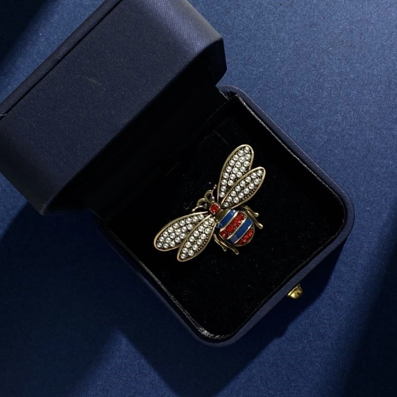 Value-priced Gucci Brooches