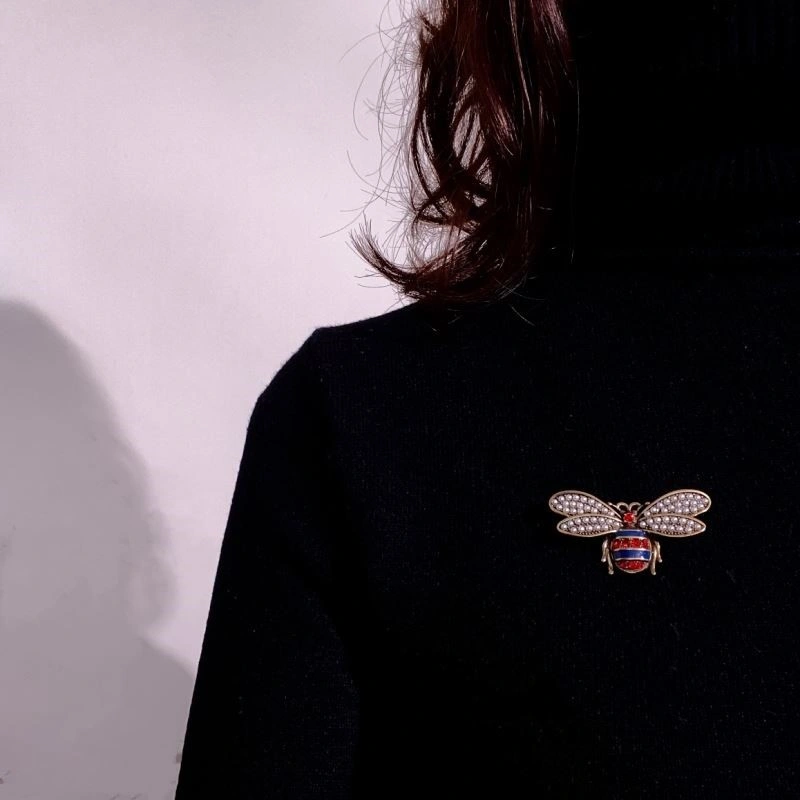 Value-priced Gucci Brooches