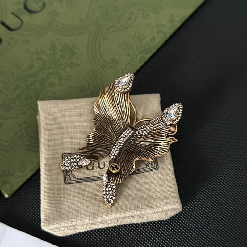 Value-priced Gucci Brooches