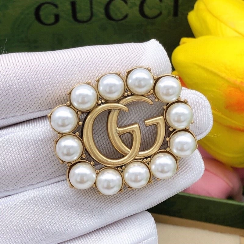 Low-cost Gucci Brooches