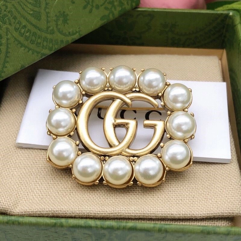 Low-cost Gucci Brooches