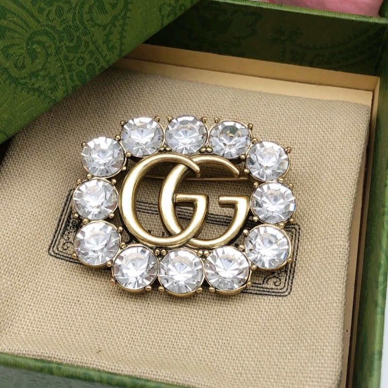 Low-cost Gucci Brooches