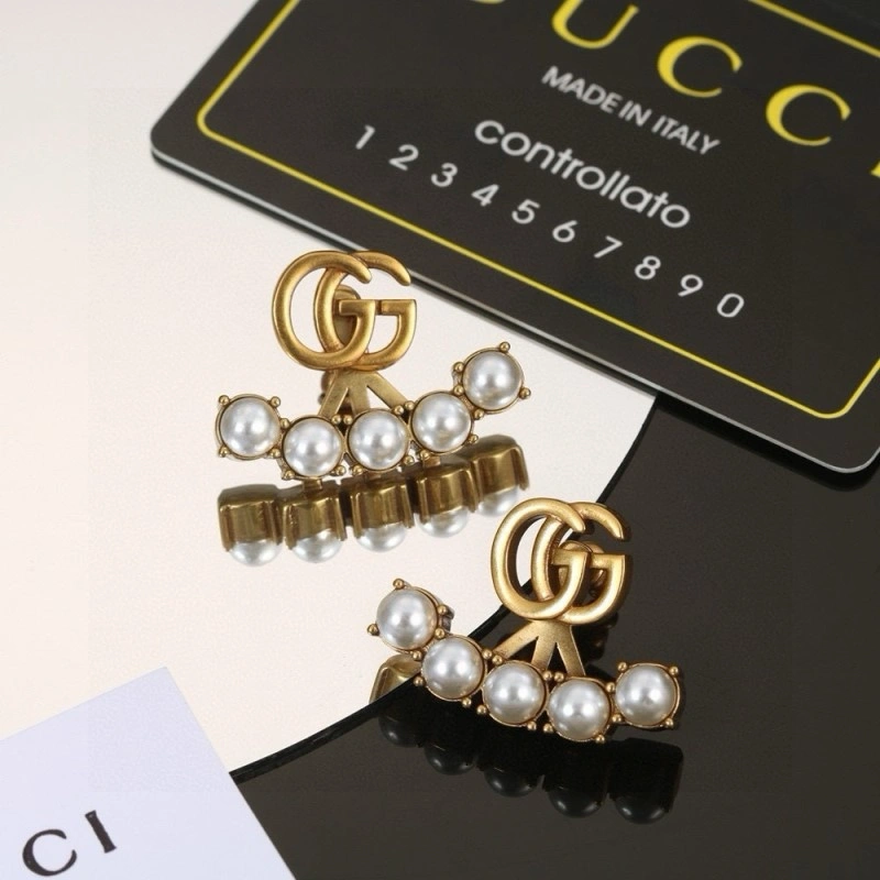 Value-priced Gucci Brooches
