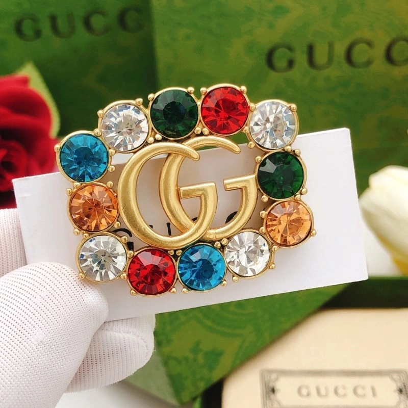 Cut-rate Gucci Brooches