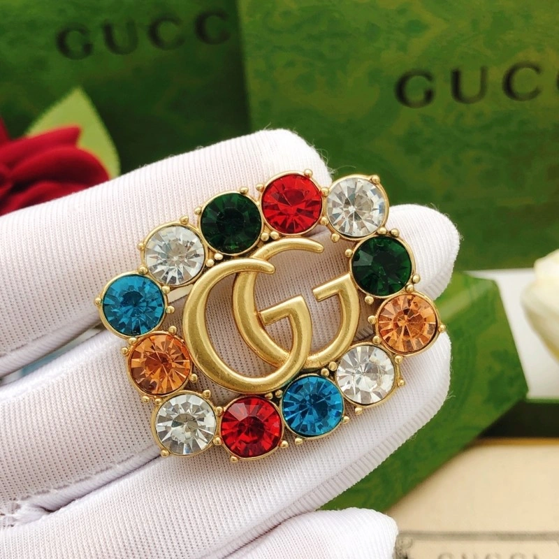 Cut-rate Gucci Brooches