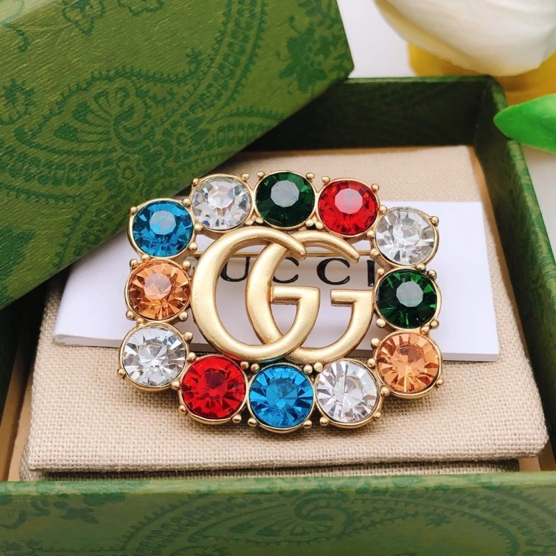 Cut-rate Gucci Brooches