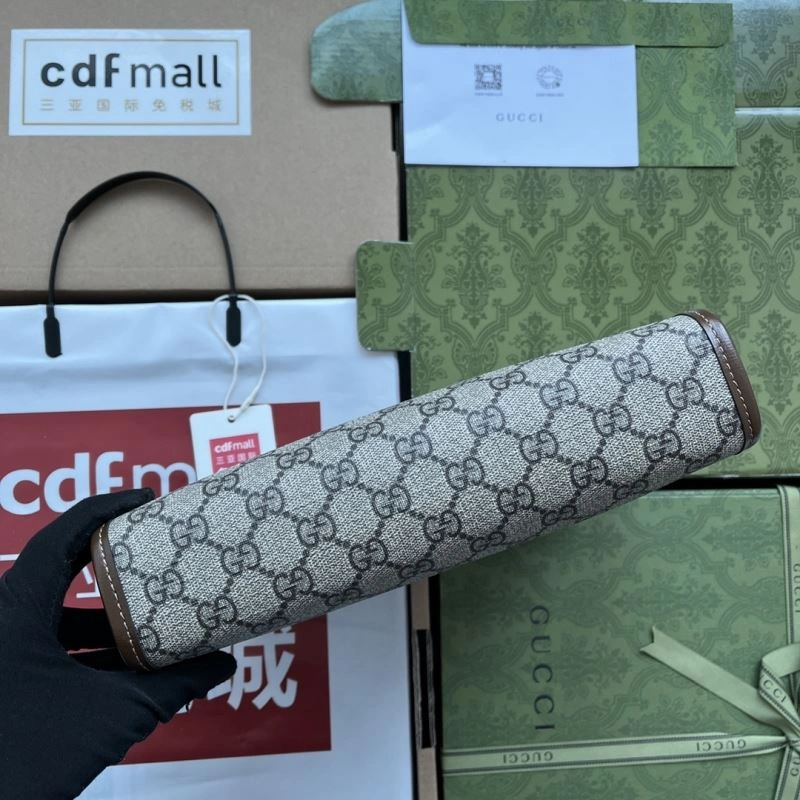 Indistinguishable Gucci Clutch Bags