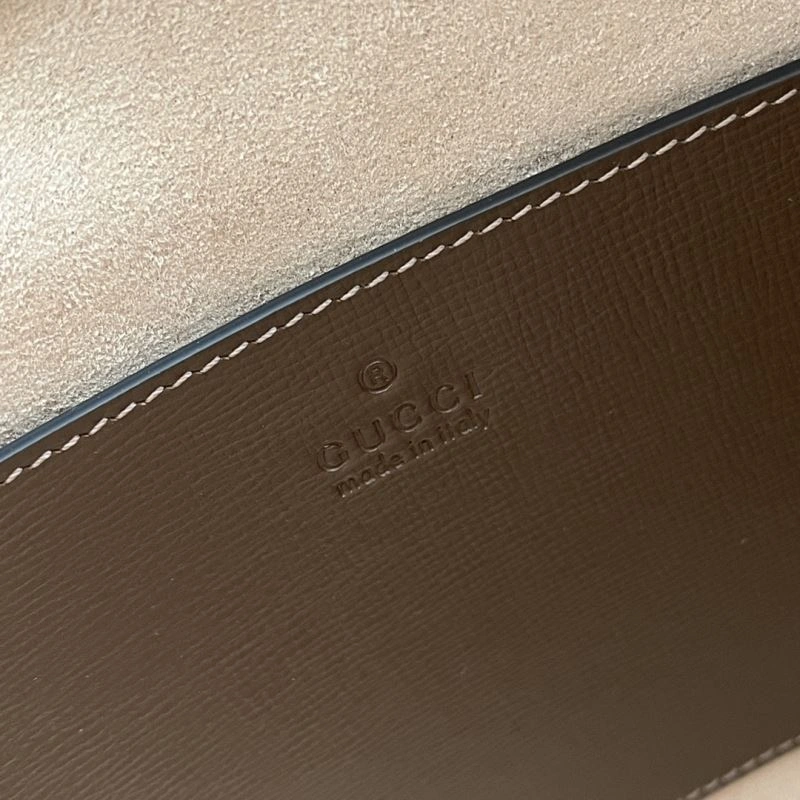 Indistinguishable Gucci Clutch Bags