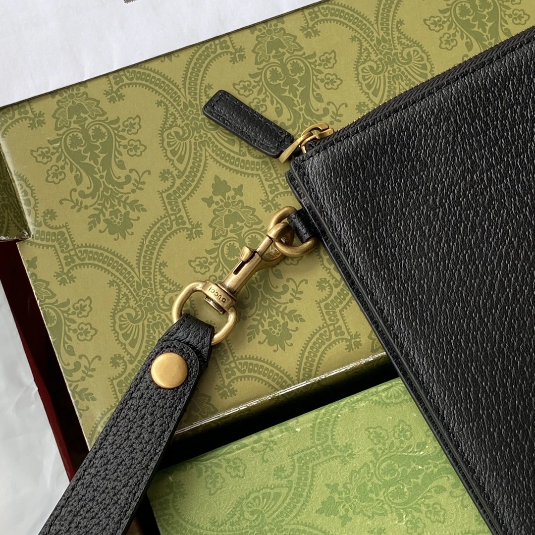 Indistinguishable Gucci Clutch Bags