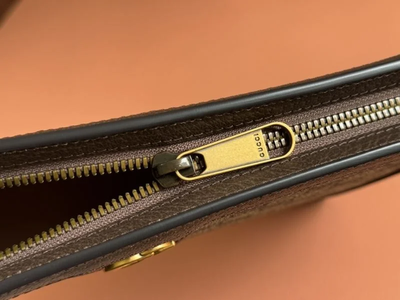 Indistinguishable Gucci Clutch Bags
