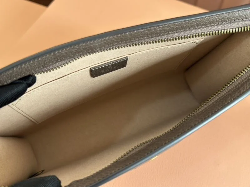 Indistinguishable Gucci Clutch Bags