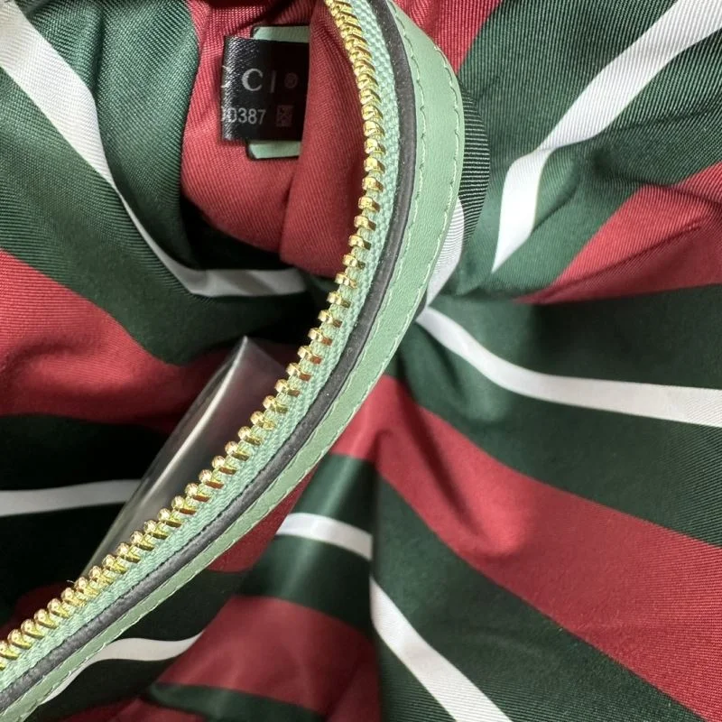 Value-priced Gucci Drawstring Bags