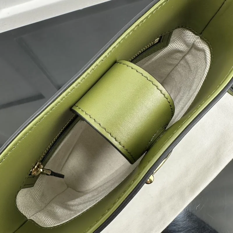 Indistinguishable Gucci Drawstring Bags