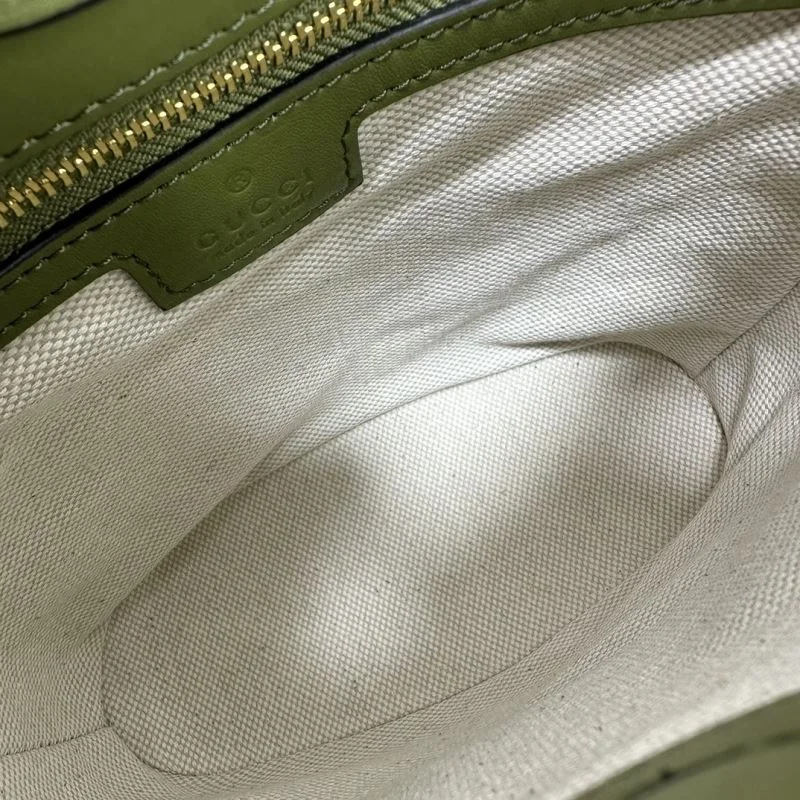 Indistinguishable Gucci Drawstring Bags