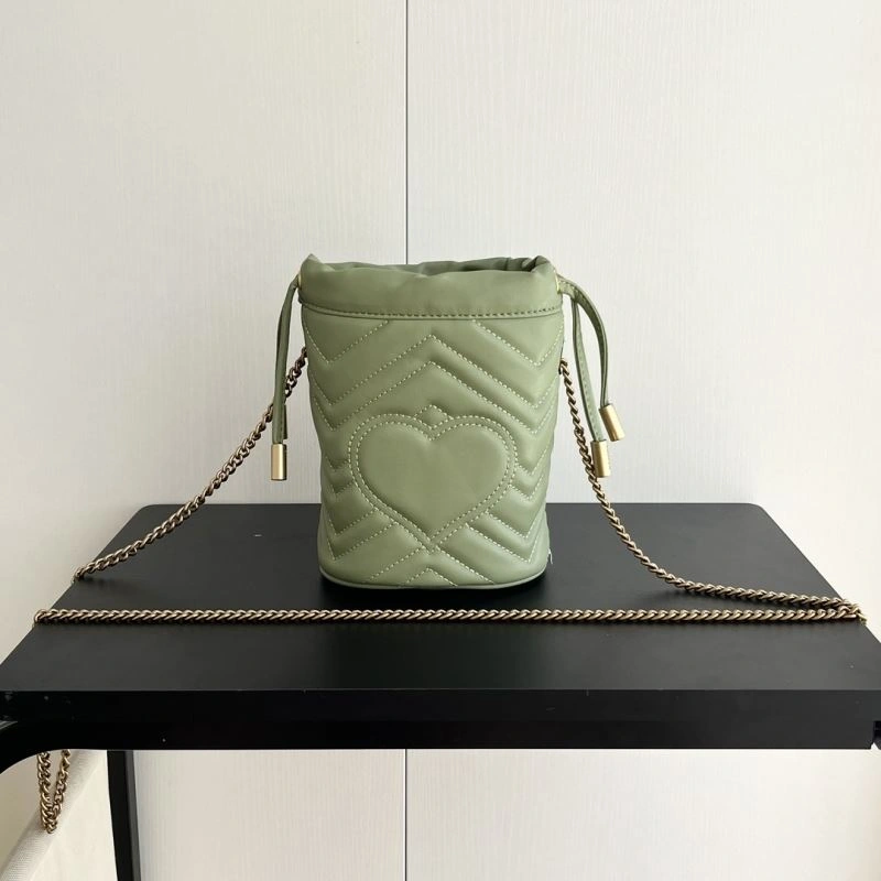 Indistinguishable Gucci Drawstring Bags
