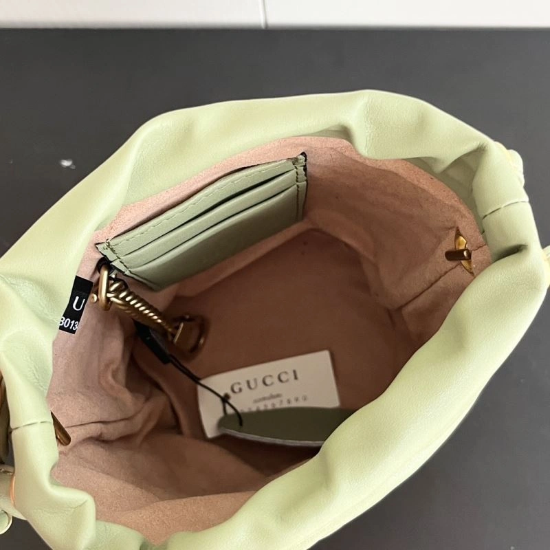 Indistinguishable Gucci Drawstring Bags