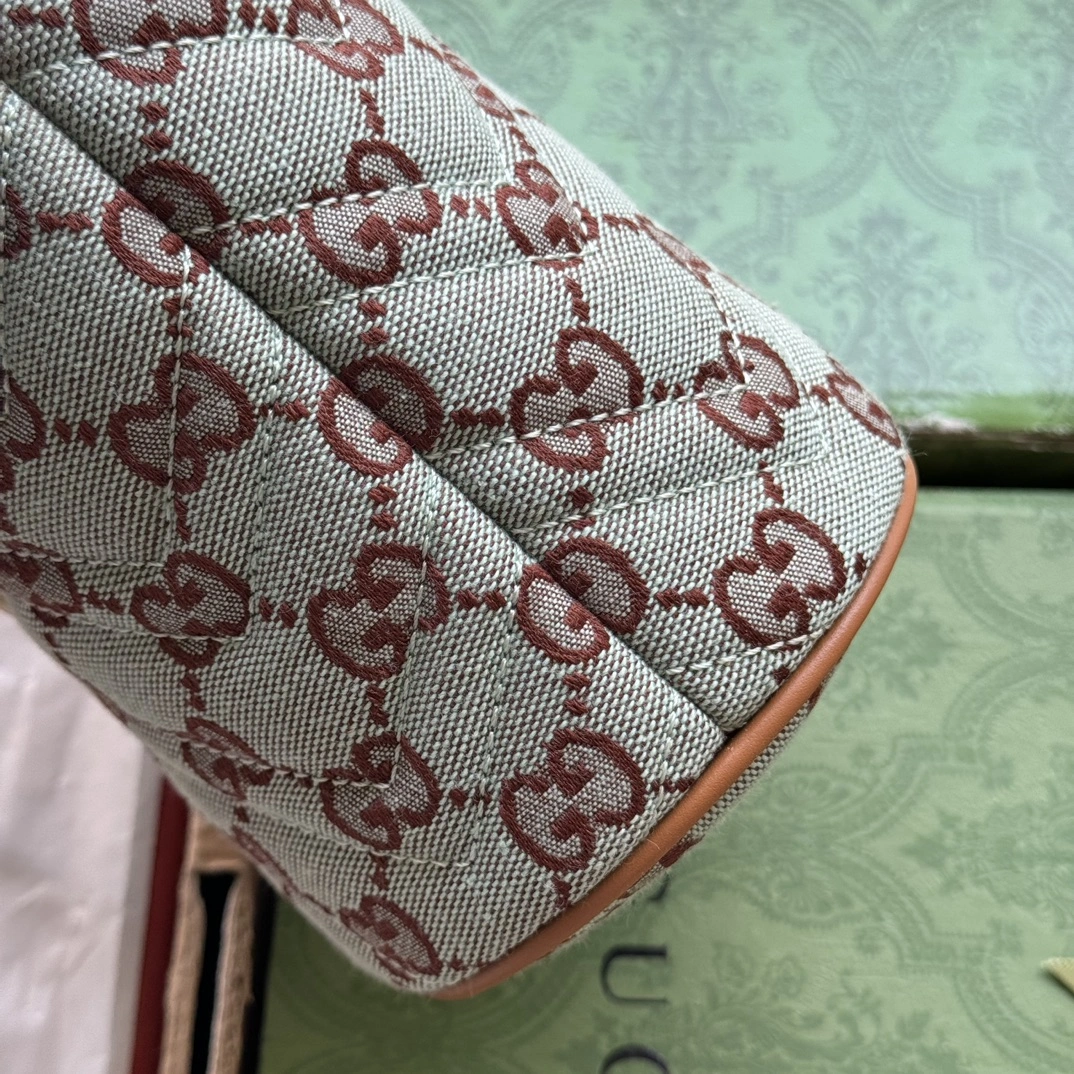 Indistinguishable Gucci Drawstring Bags