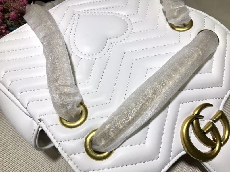 Indistinguishable Gucci Satchel Bags