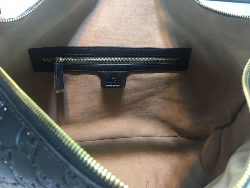 Value-priced Gucci Top Handle Bags