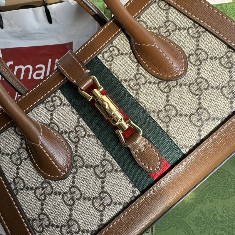 Value-priced Gucci Top Handle Bags