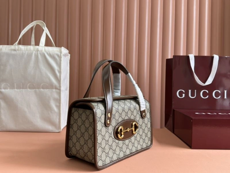 Value-priced Gucci Top Handle Bags