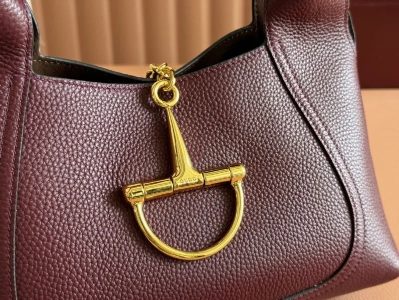 Value-priced Gucci Top Handle Bags