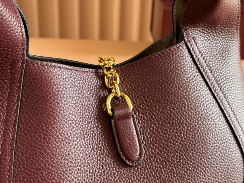 Value-priced Gucci Top Handle Bags