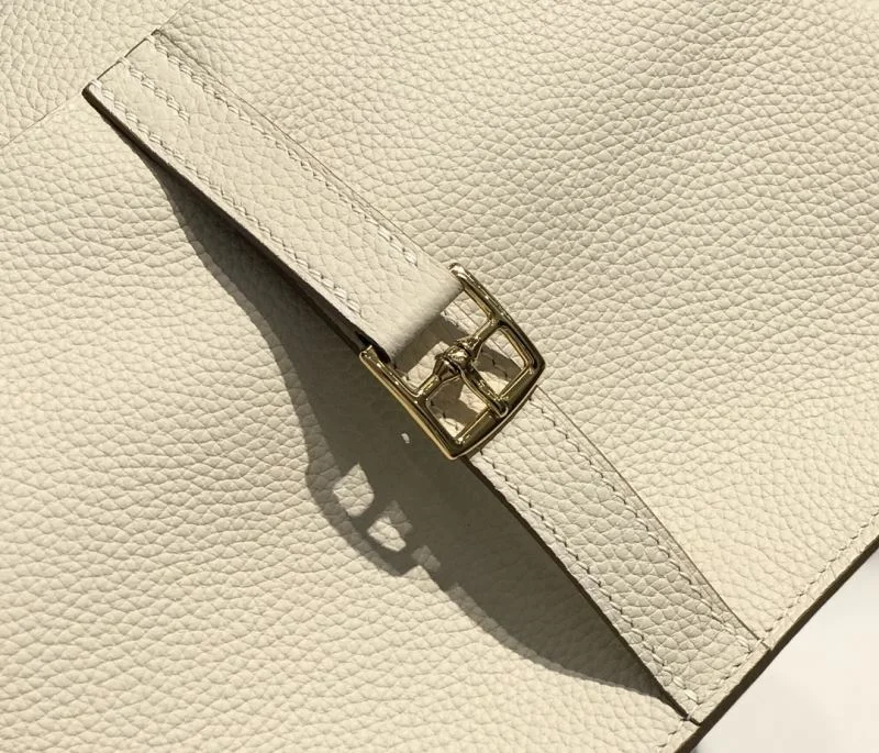 Brand-authenticated Hermes Halzan Bags