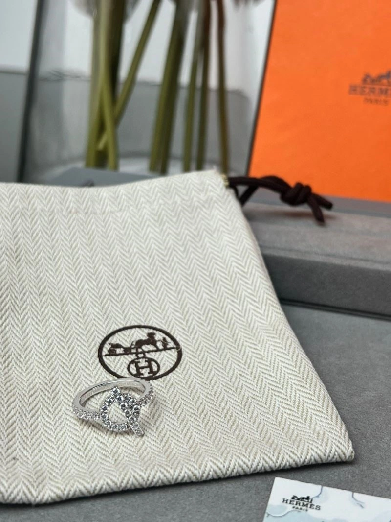 Real Hermes Rings
