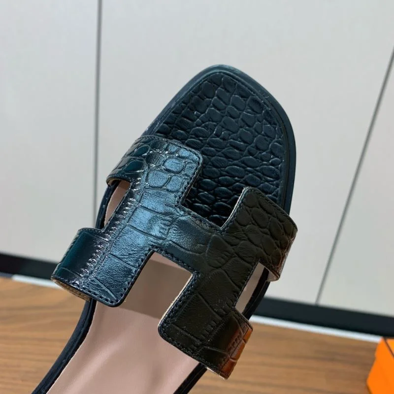 Indistinguishable Hermes Slippers
