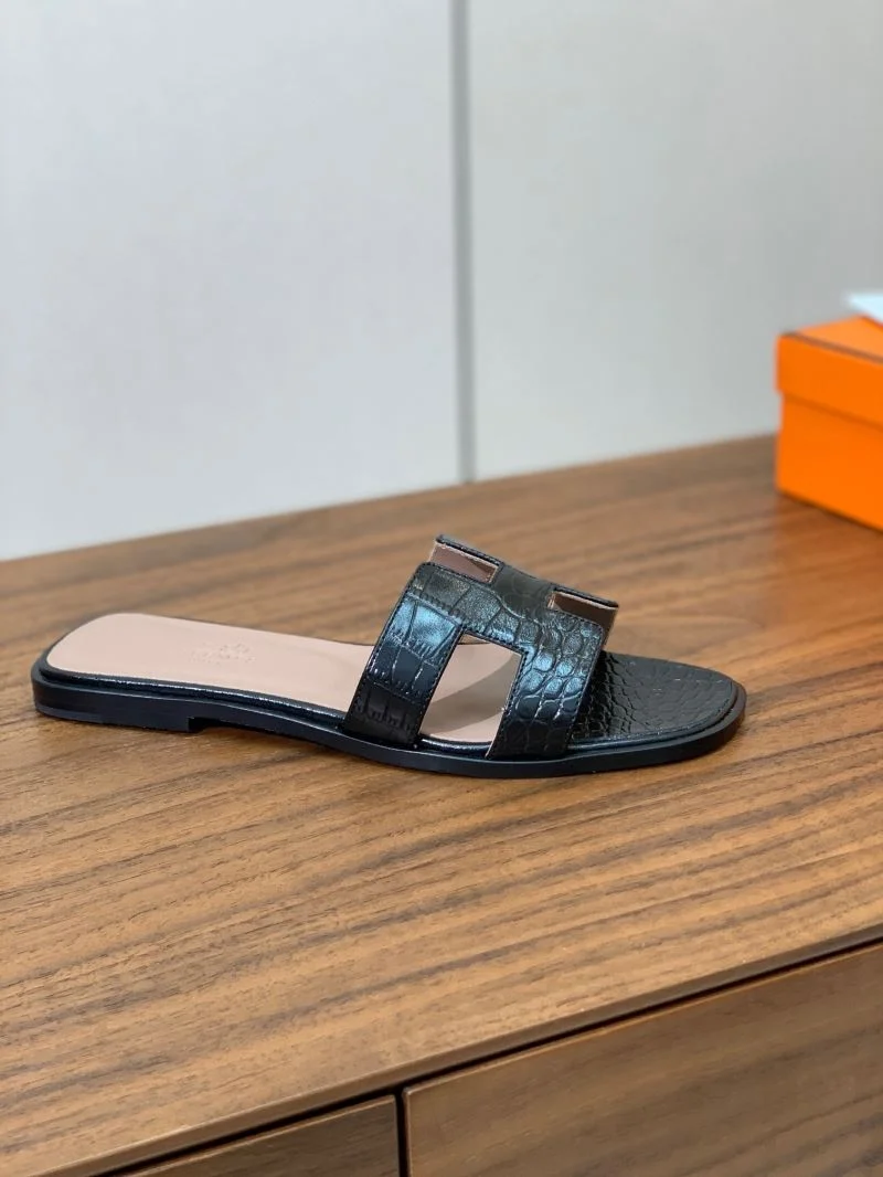 Indistinguishable Hermes Slippers