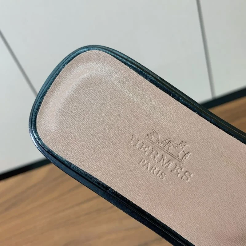 Indistinguishable Hermes Slippers