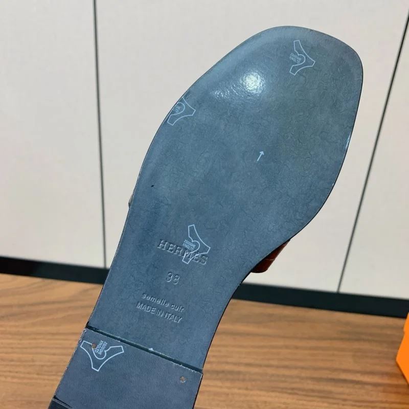 Indistinguishable Hermes Slippers