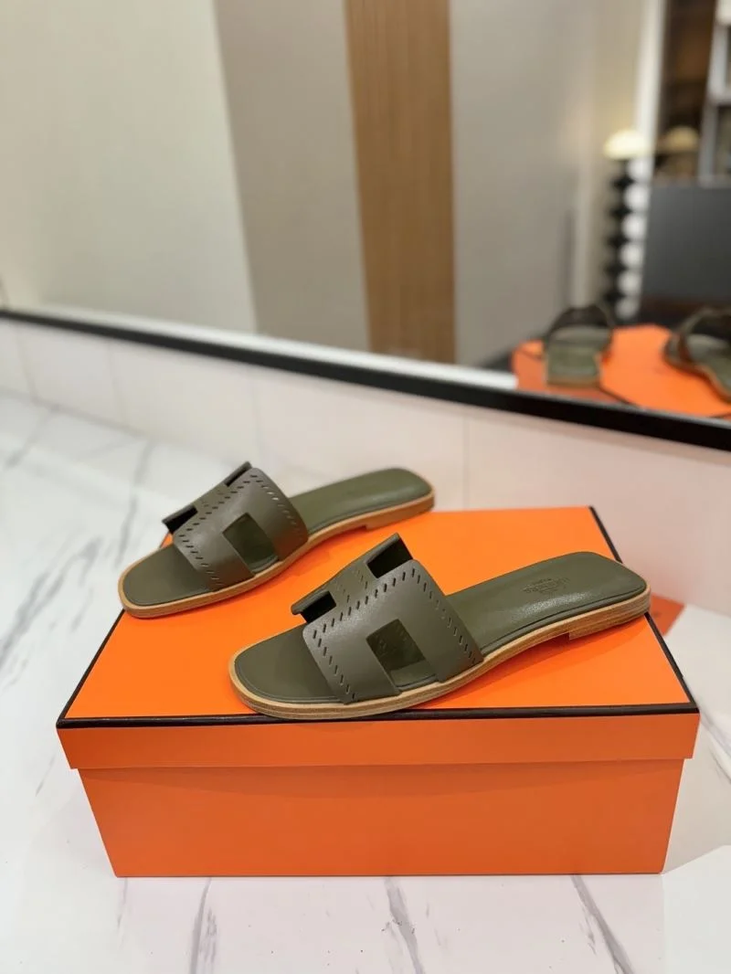Indistinguishable Hermes Slippers