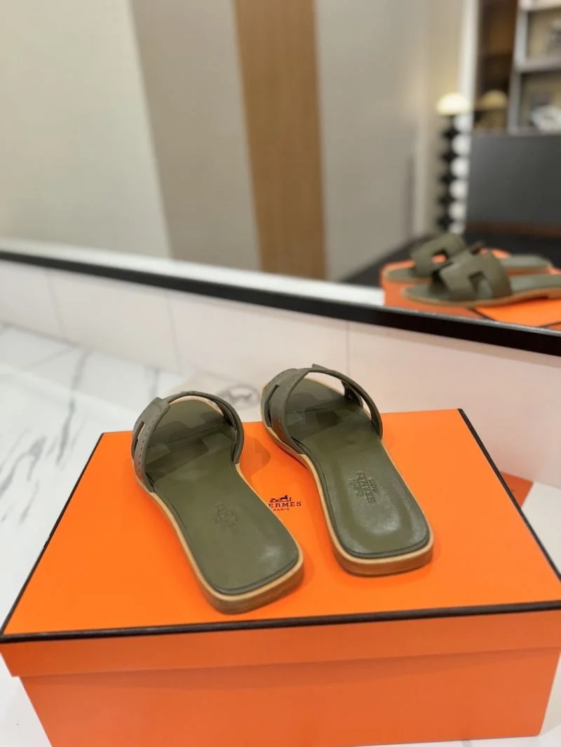Indistinguishable Hermes Slippers