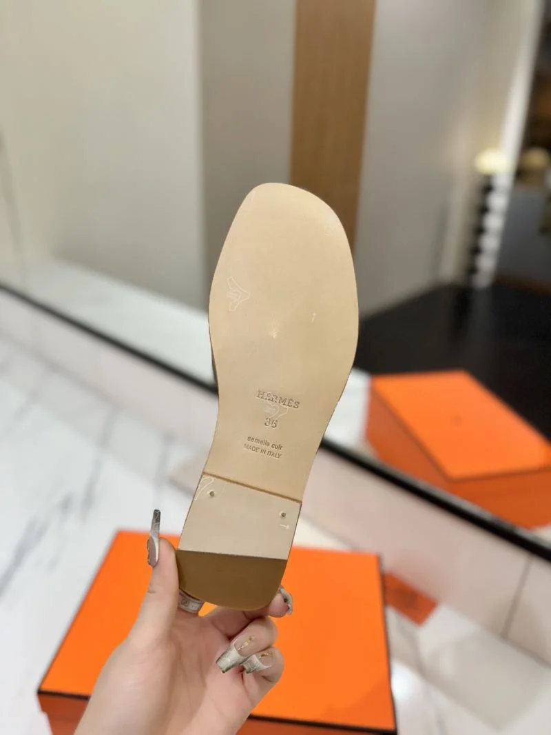 Indistinguishable Hermes Slippers