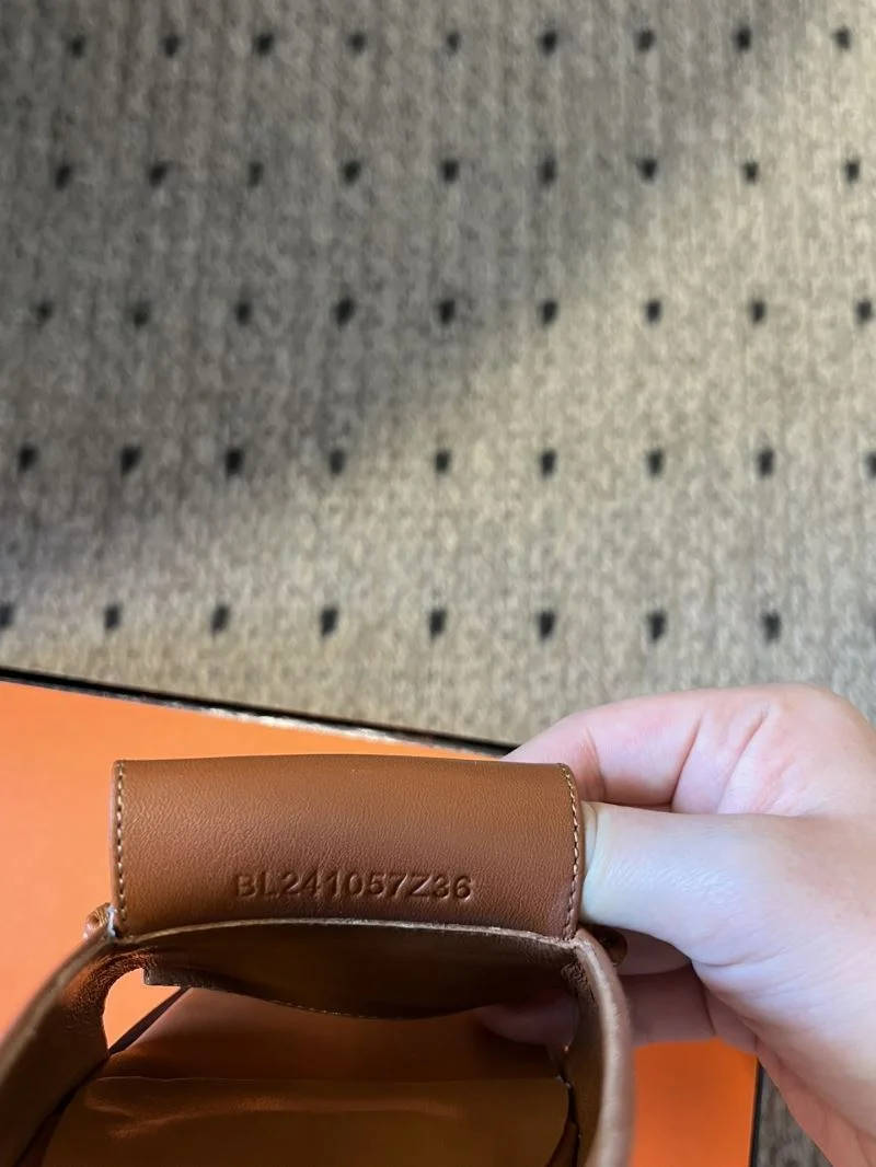 Indistinguishable Hermes Slippers