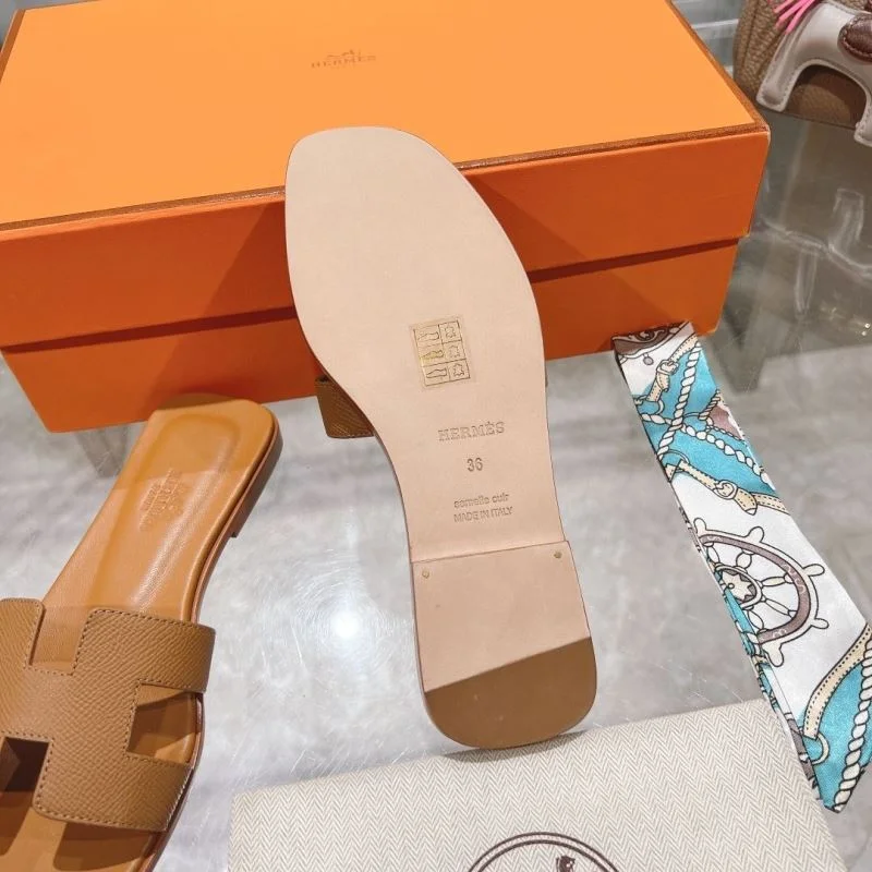 Indistinguishable Hermes Slippers