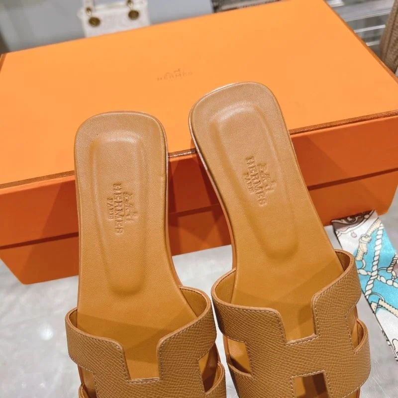 Indistinguishable Hermes Slippers